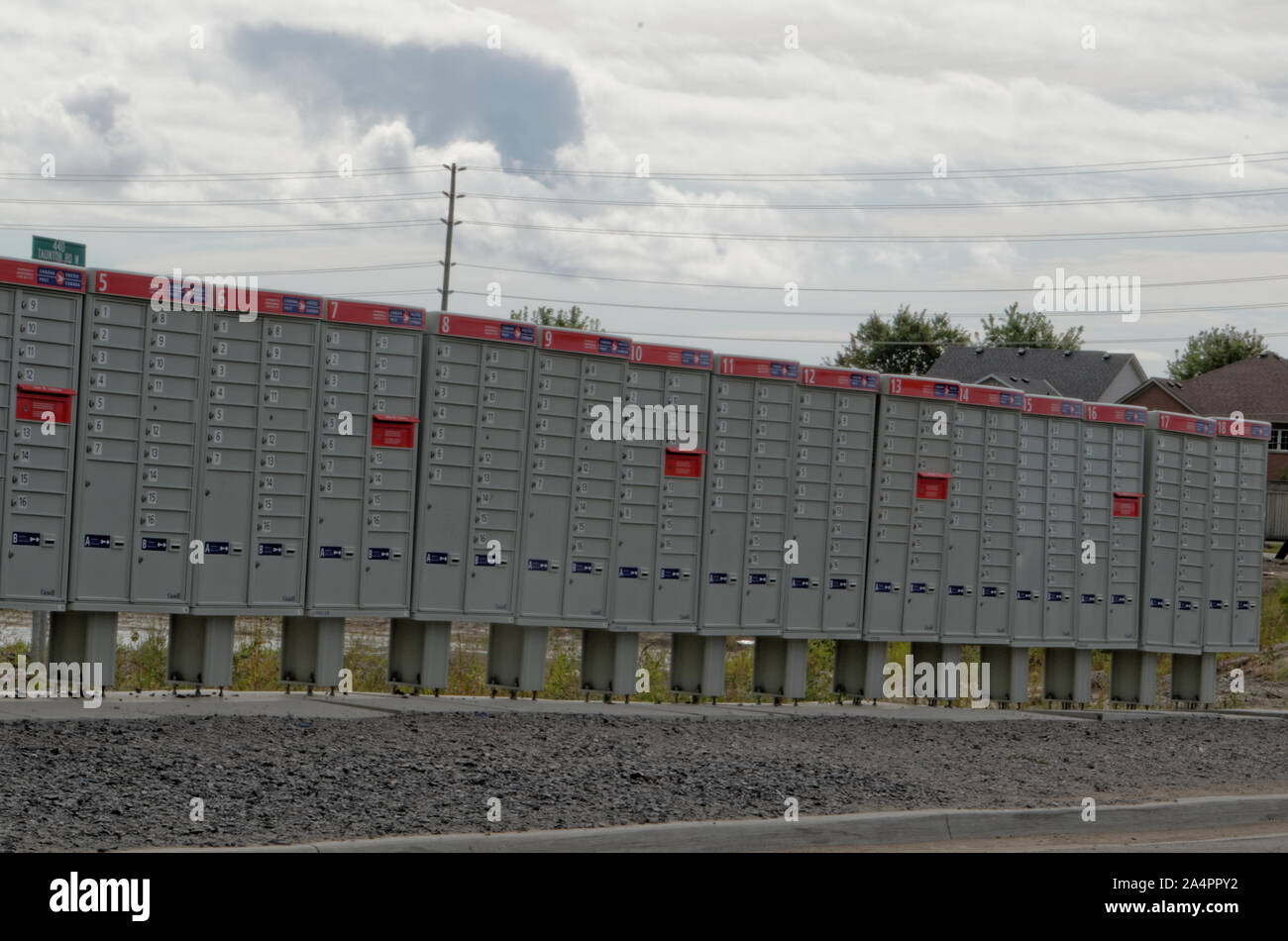 Community mailboxes hi-res stock photography and images - Alamy