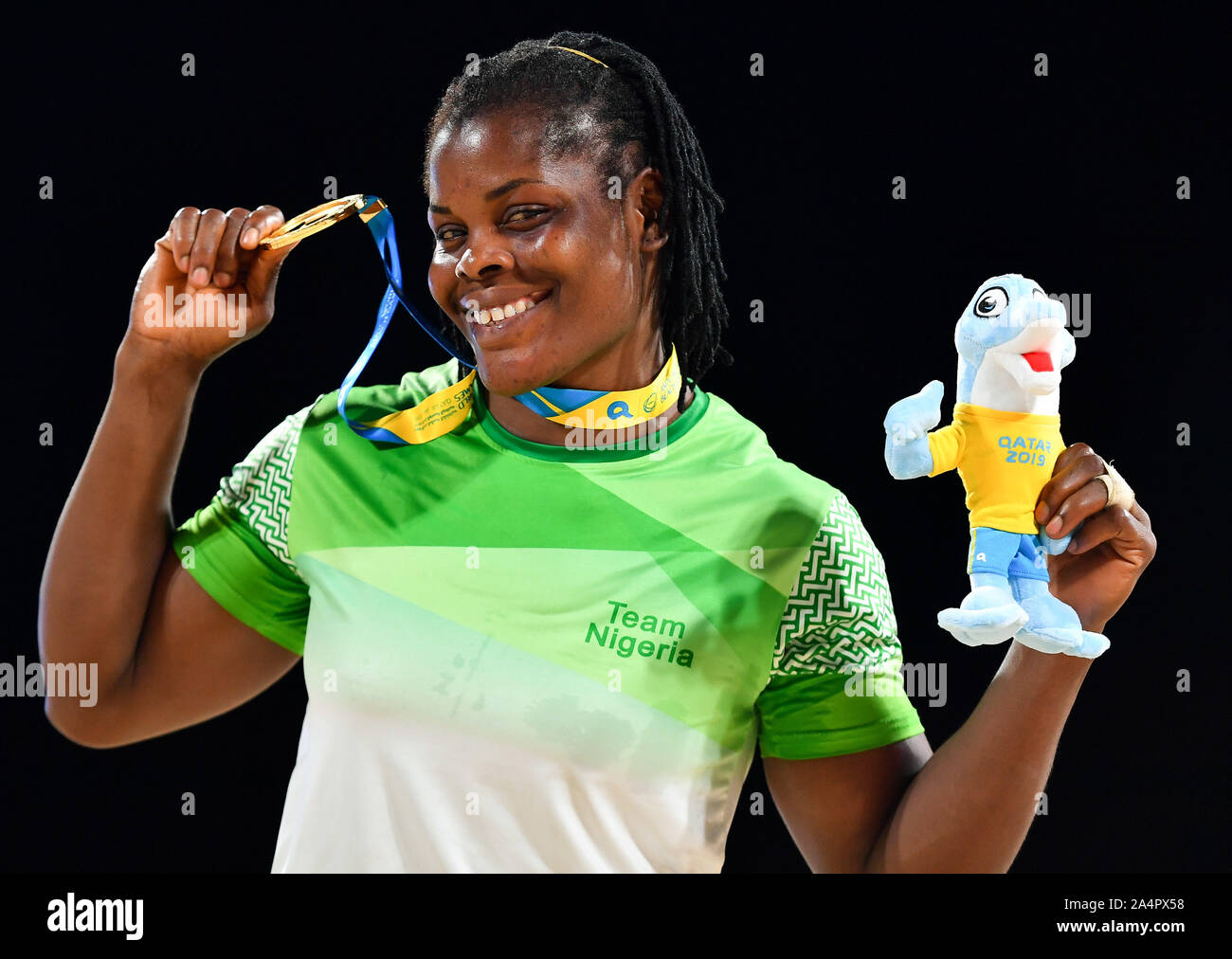 Doha, Qatar. 15th Oct, 2019. Gold medalist Blessing Joy Onyebuchi of Nigeria poses for photos ...