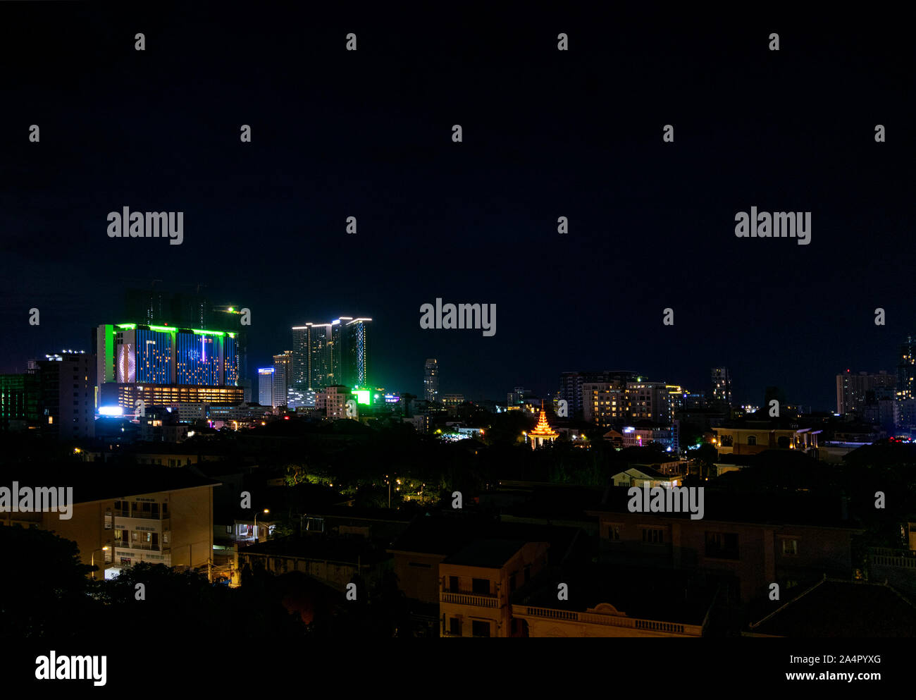 downtown central phnom penh city night view in cambodia with Naga World ...