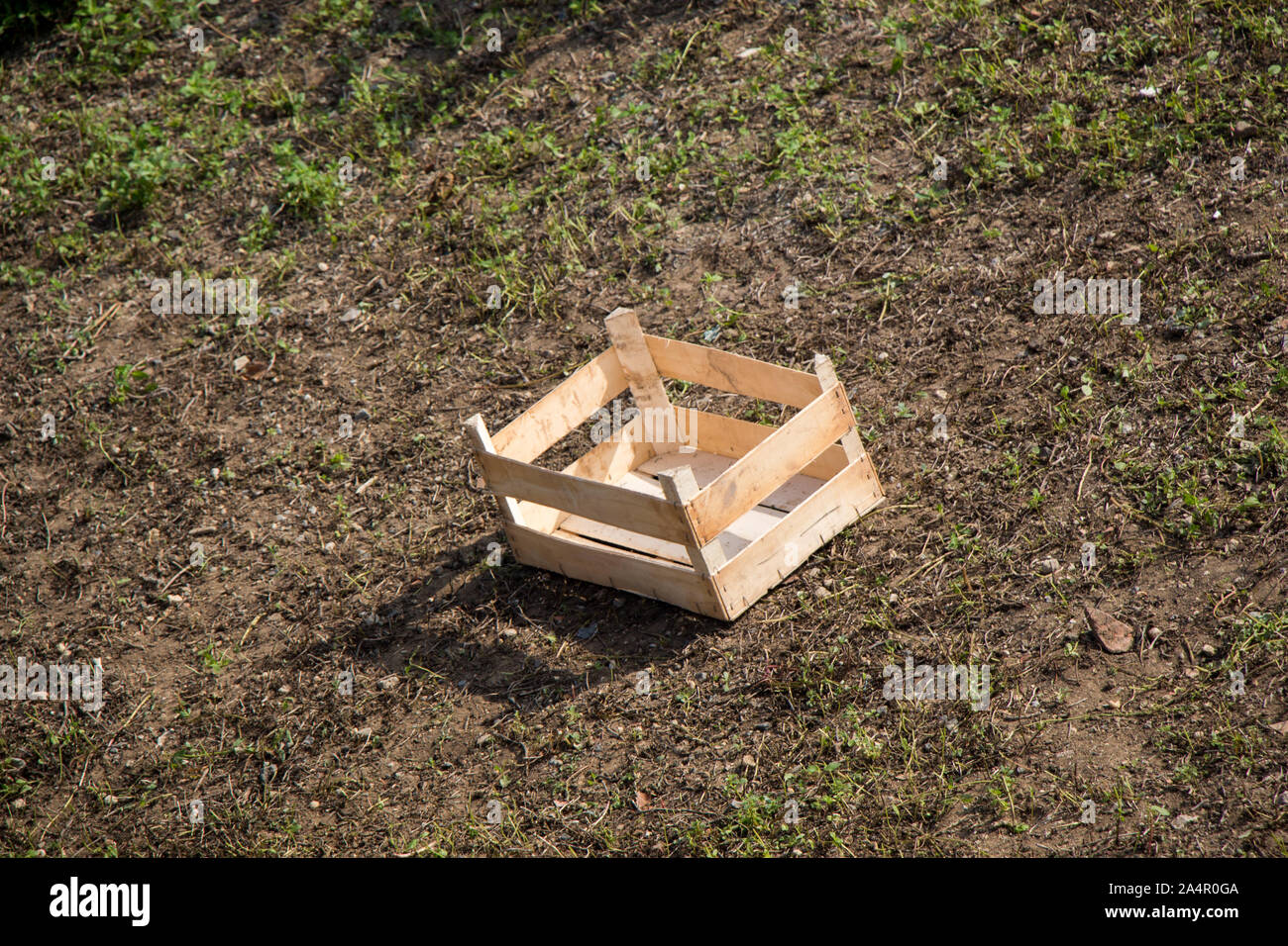 Wooden crate boxes in the field Stock Photo - Alamy