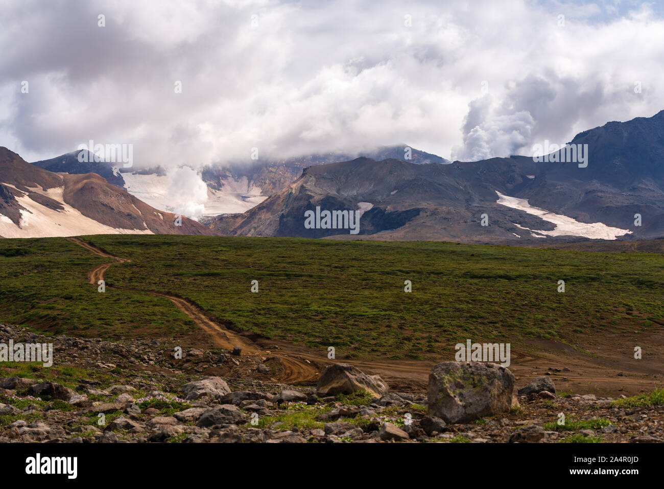 Autumn volcanic landscape of Kamchatka Peninsula, view of cone active ...