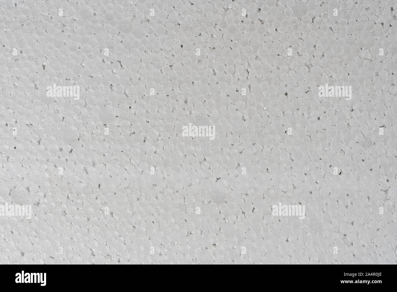 White abstract polystyrene foam background texture close-up detail view ...