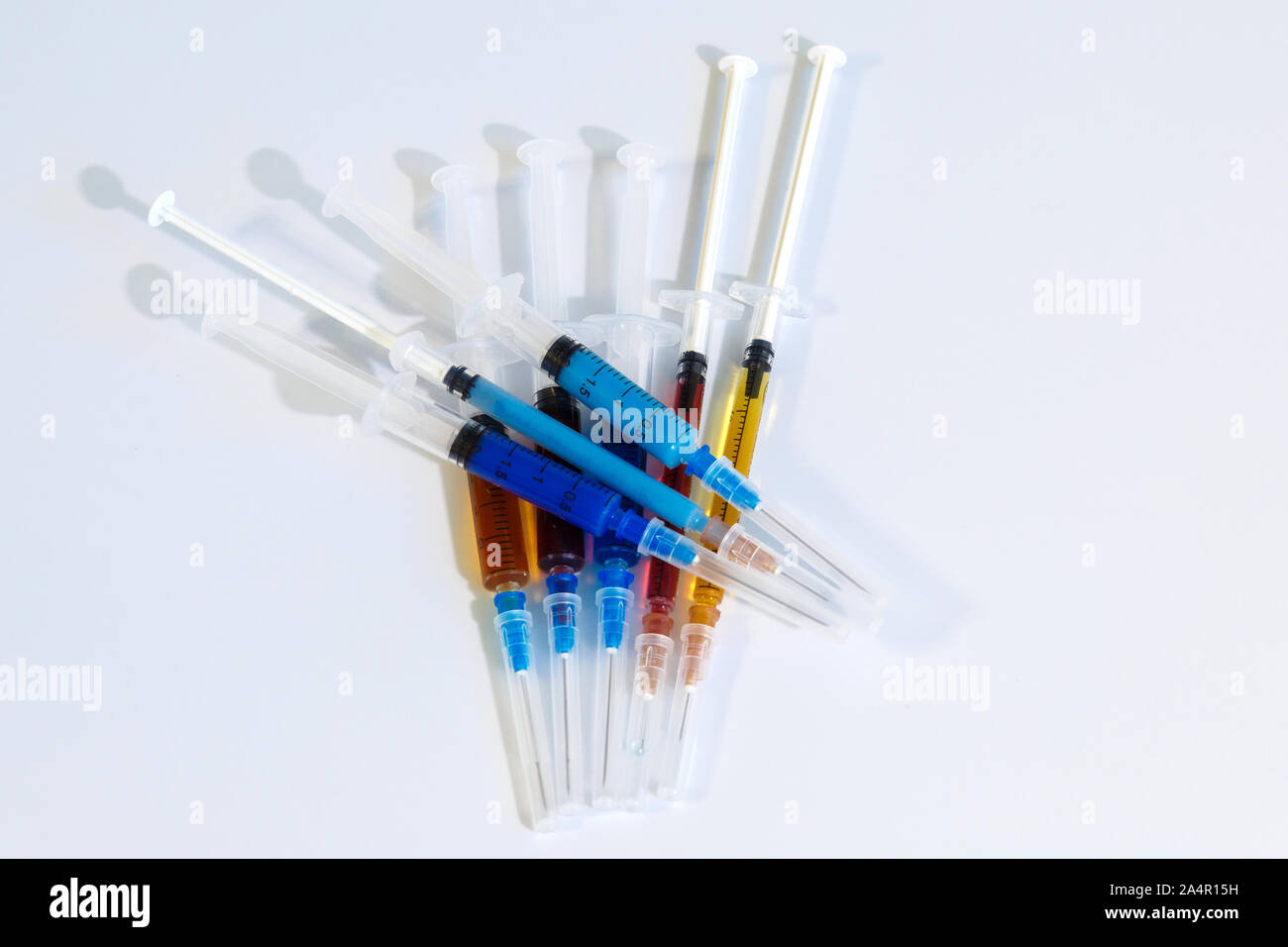 Medical syringes with colorful injections for cosmetology. Syringes ...
