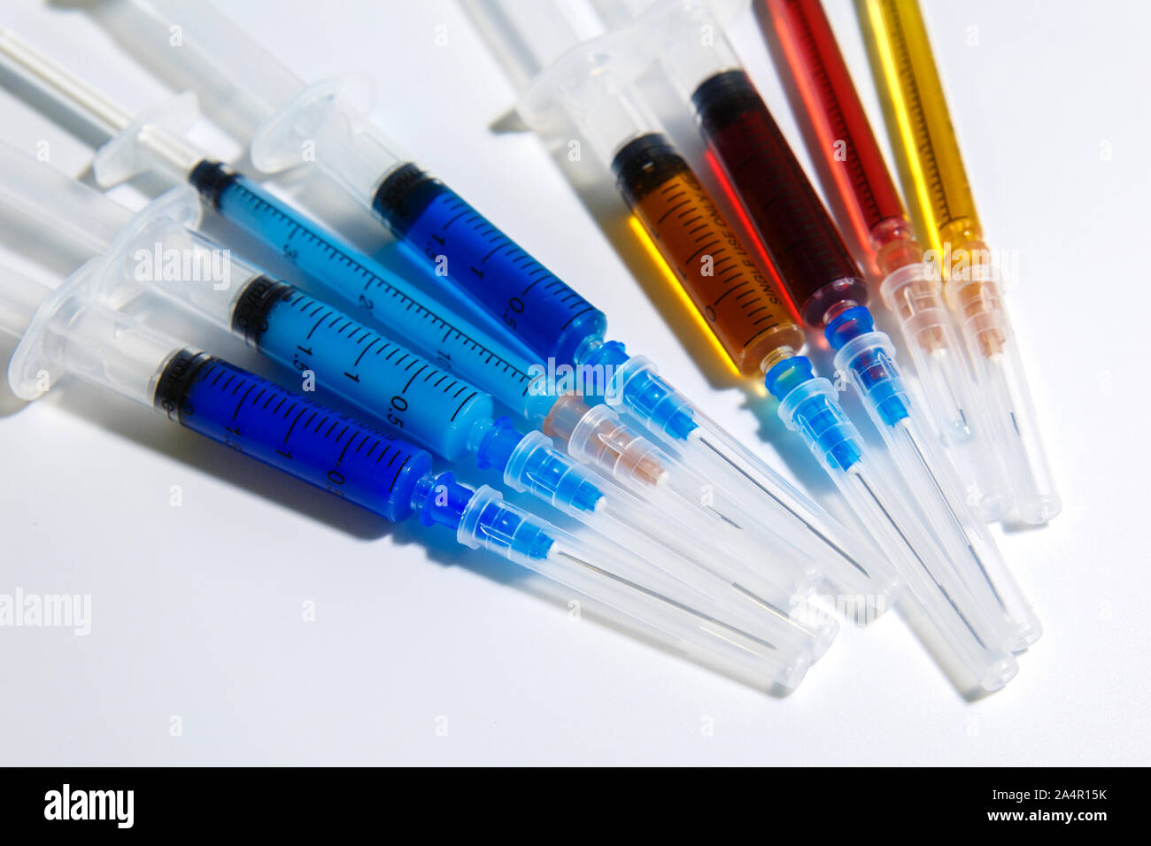 Medical syringes with colorful injections for cosmetology. Syringes ...