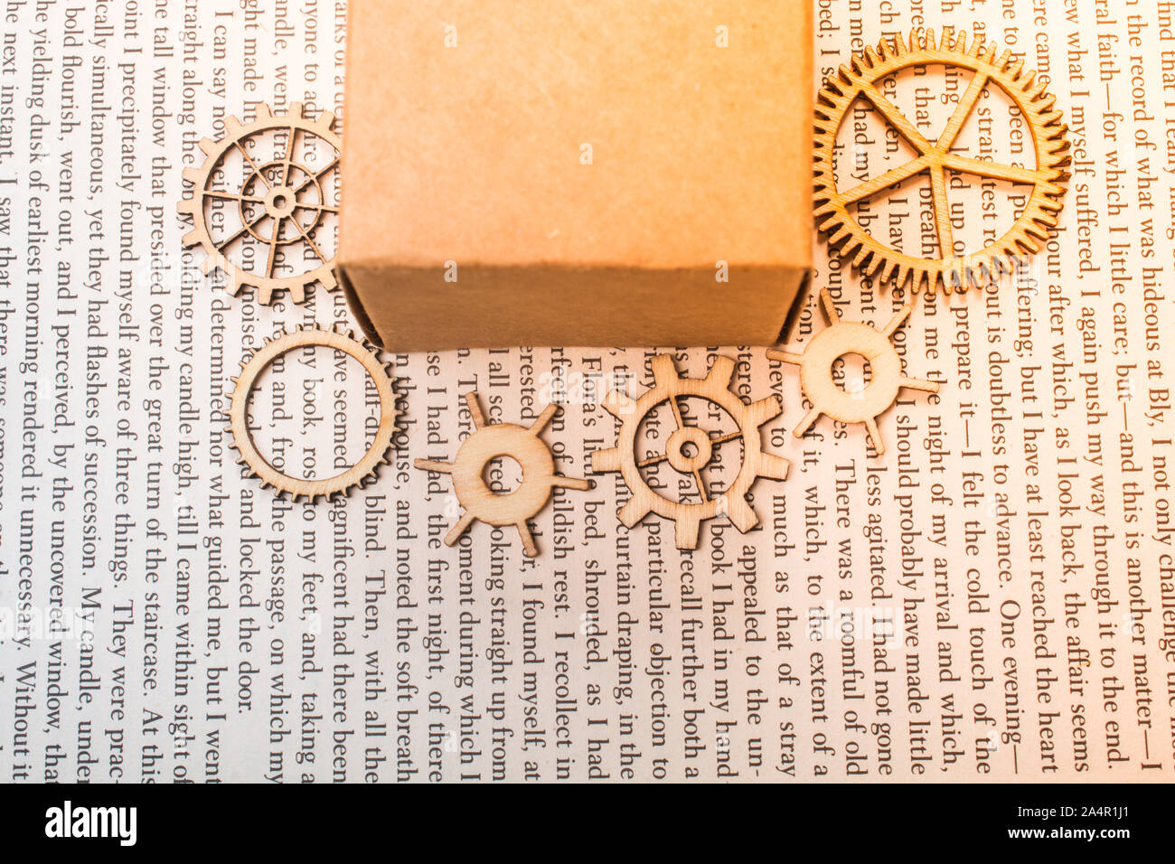 Wooden cogwheels around box as Industry concept concept Stock Photo - Alamy