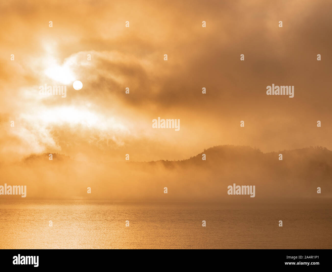 Dawn sun rising orange sky clouds hi-res stock photography and images ...