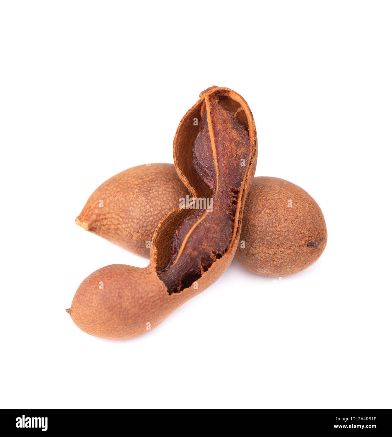 Sweet tamarind isolated on white background. Two fresh whole tamarinds ...