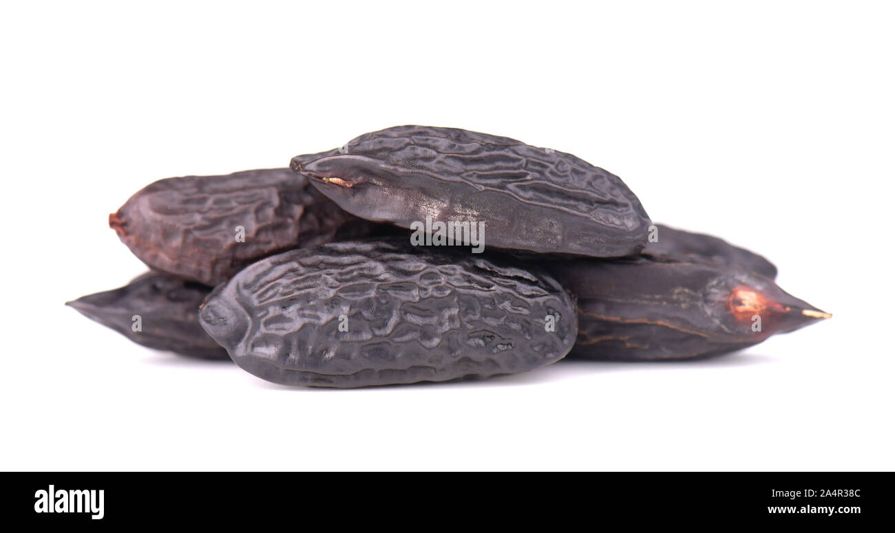 Tonka beans isolated on white background. Bean of Dipteryx odorata ...
