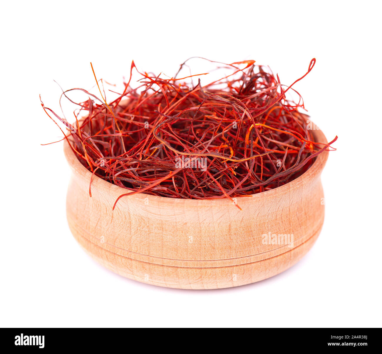 Red chili pepper threads in the wooden bowl, isolated on white ...