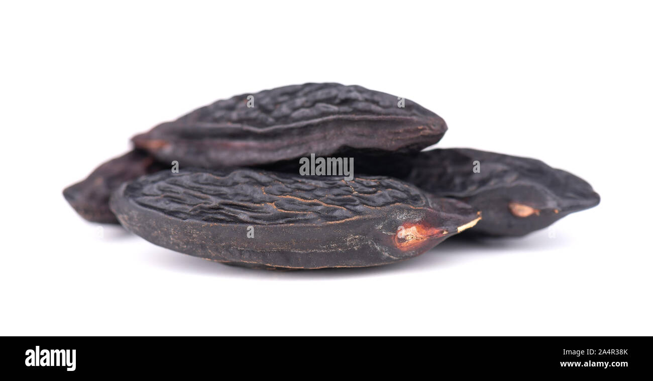 Tonka beans isolated on white background. Bean of Dipteryx odorata ...