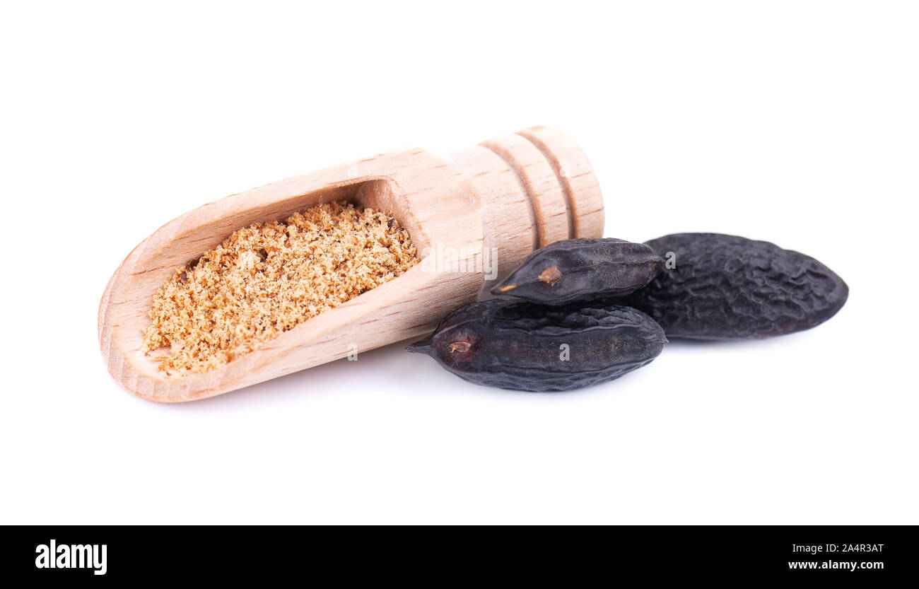 Tonka beans isolated in the wooden spoon, on white background. Bean of ...