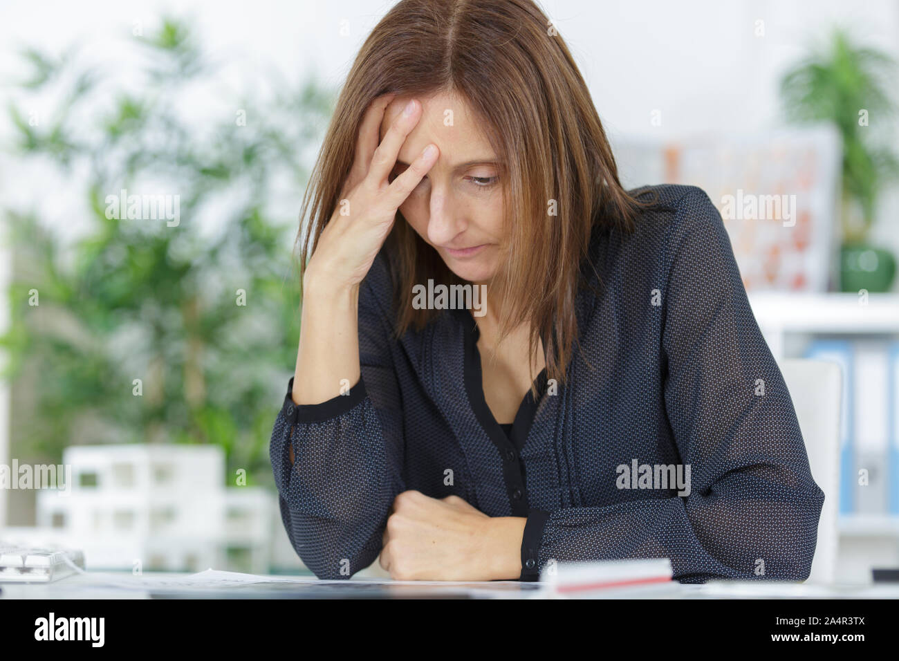 a female architect feeling stress Stock Photo - Alamy