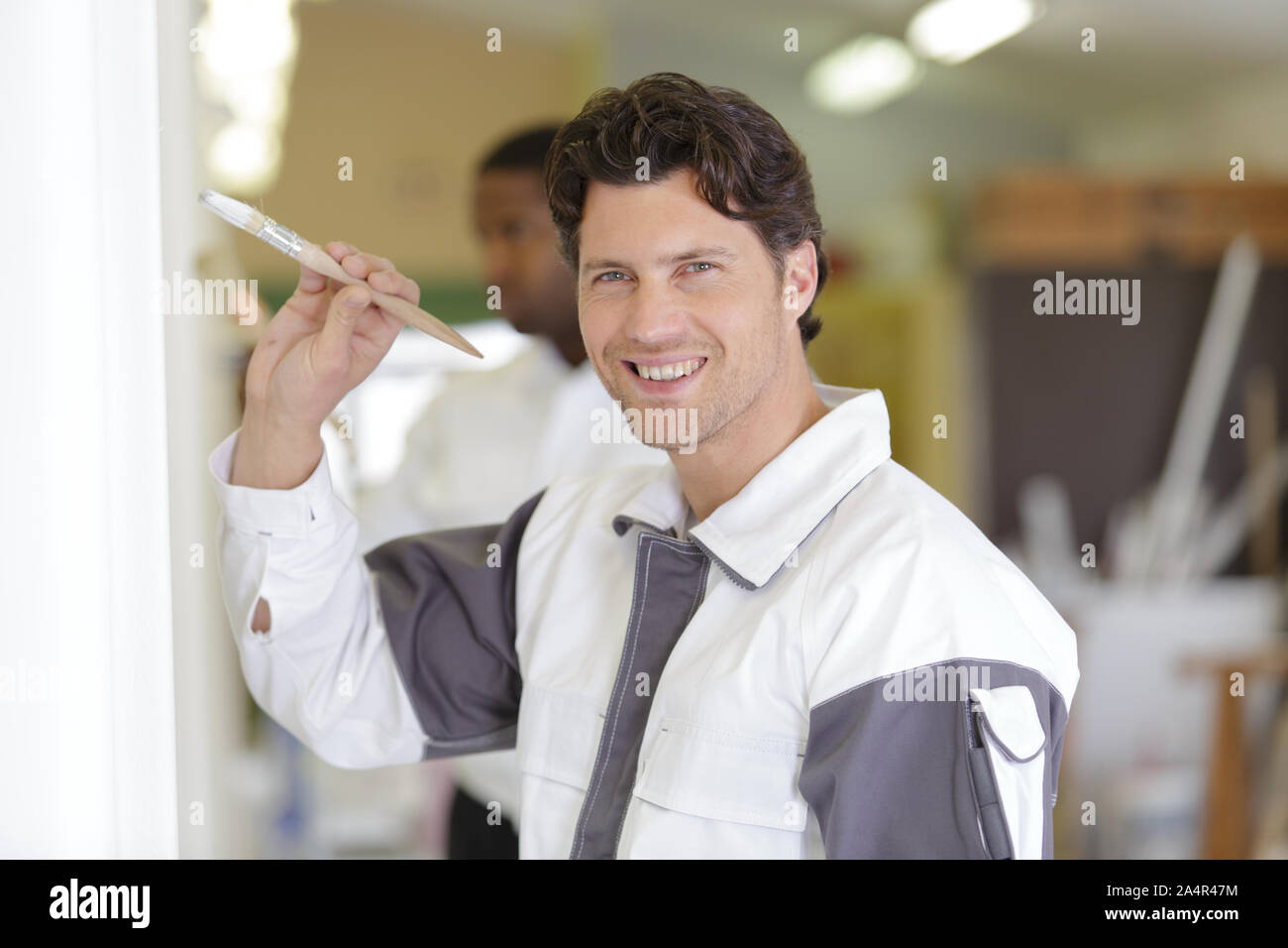 Happy male painter palette hi-res stock photography and images - Alamy