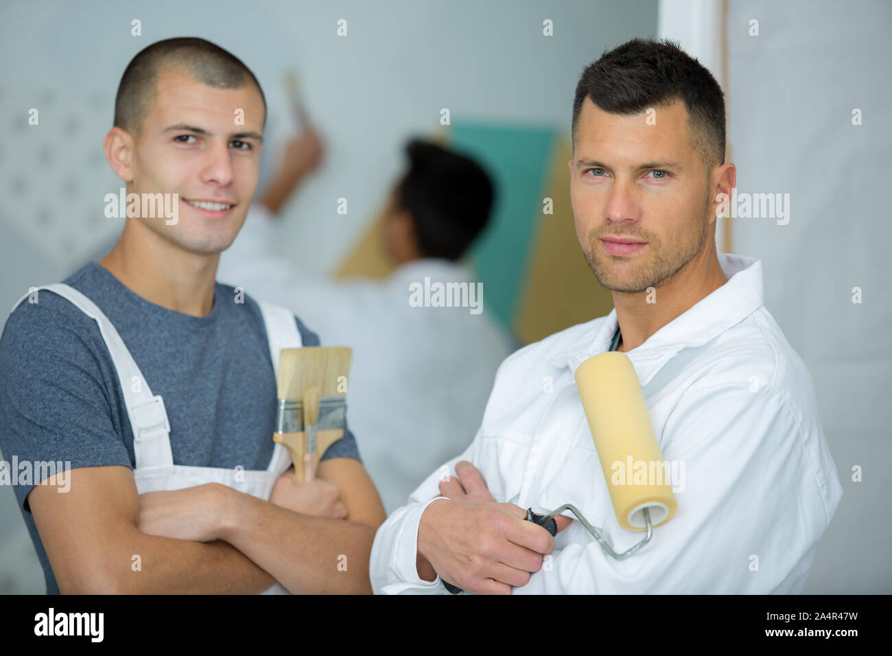 Portrait happy male worker painting hi-res stock photography and images ...