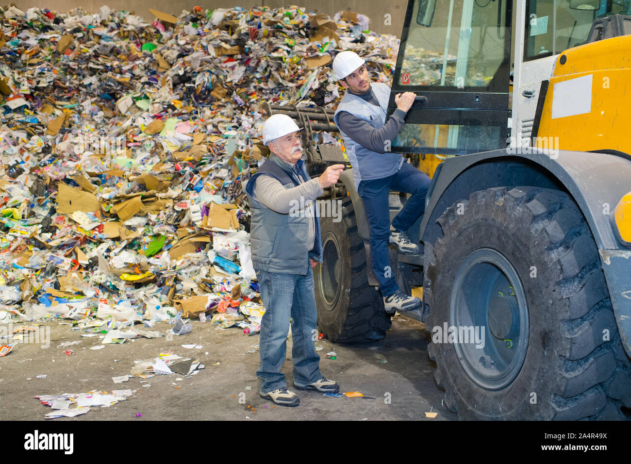 workers in a recycling factory Stock Photo - Alamy