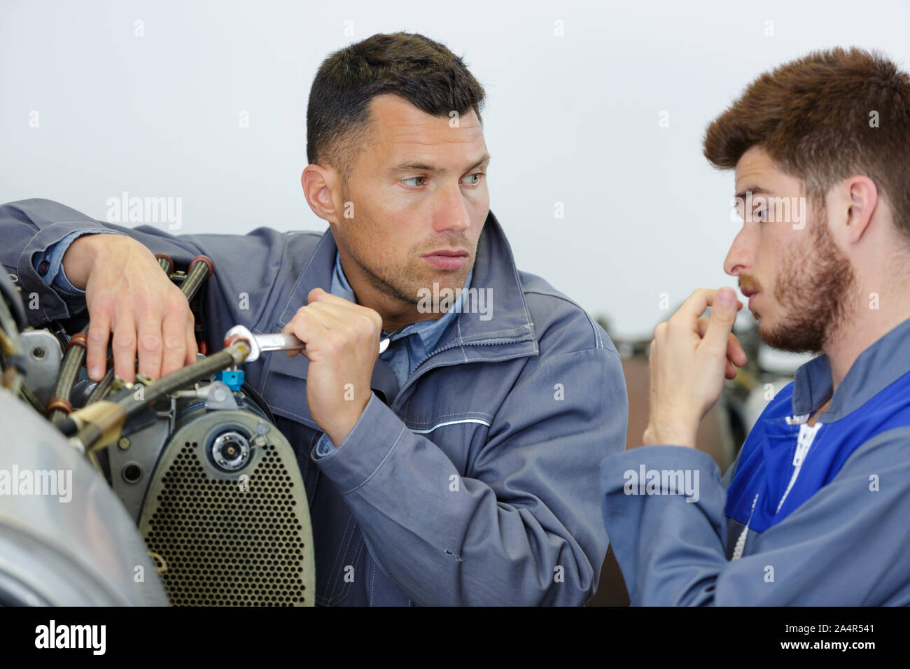Two handsome male auto hi-res stock photography and images - Alamy