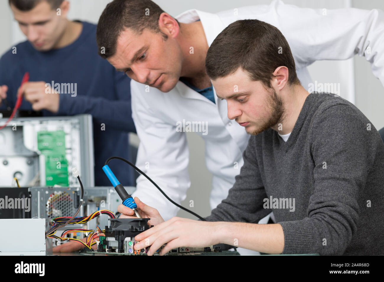 portrait of computer electronic assembler Stock Photo - Alamy