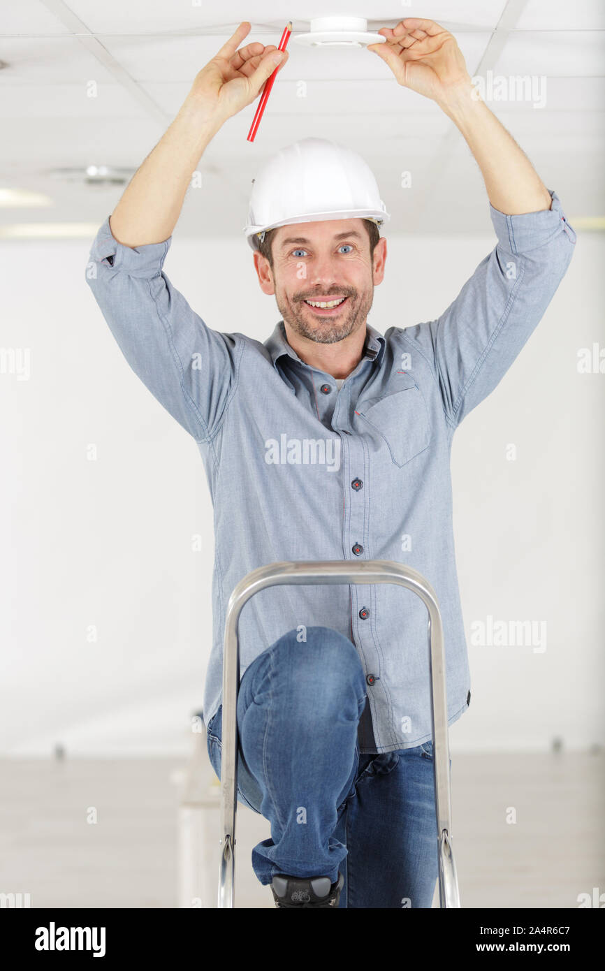 Installing a ceiling fixture hi-res stock photography and images - Alamy