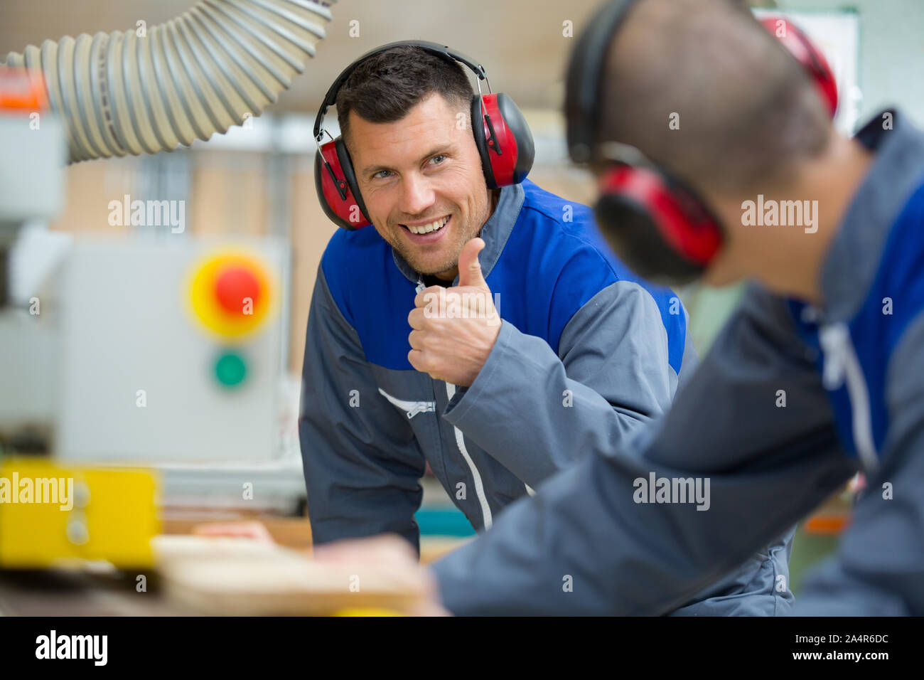 Two machines working together hi-res stock photography and images - Alamy