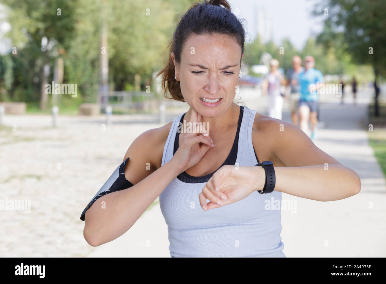 Checking pulse neck hi-res stock photography and images - Alamy