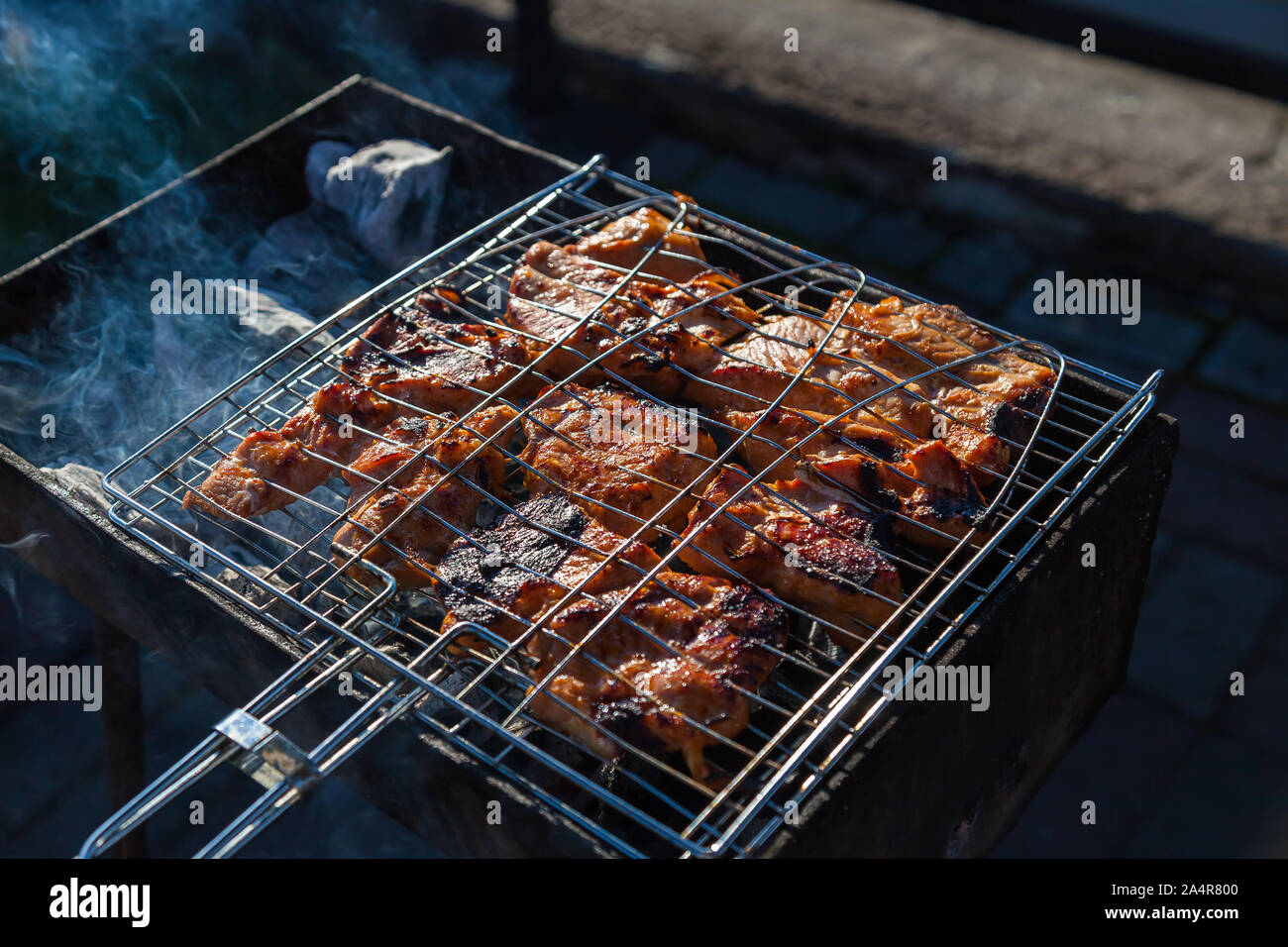 Roast chicken over an open fire hi-res stock photography and images - Alamy