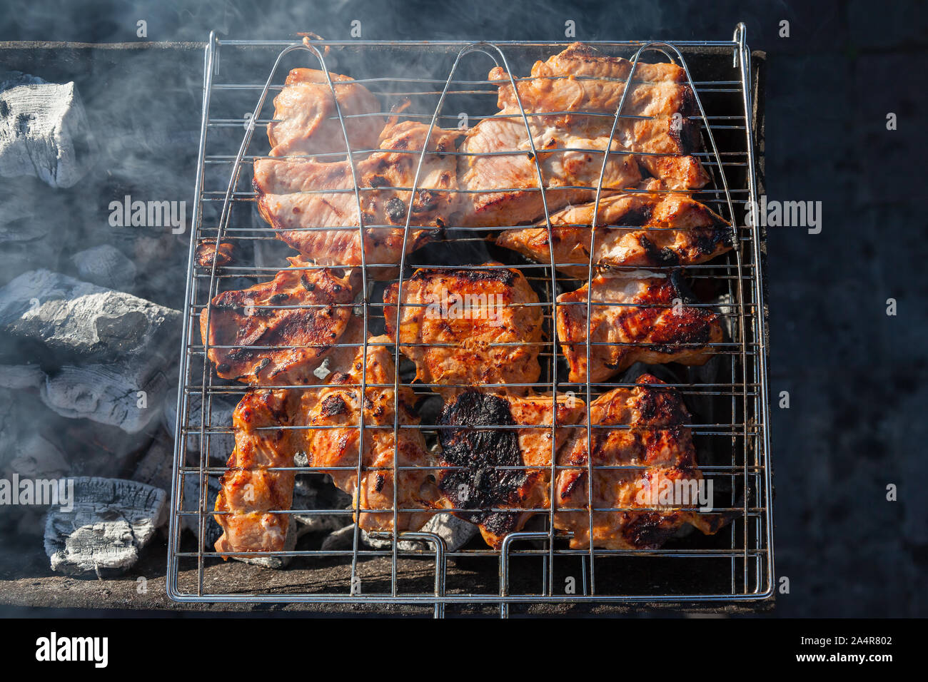 Roast chicken over an open fire hi-res stock photography and images - Alamy