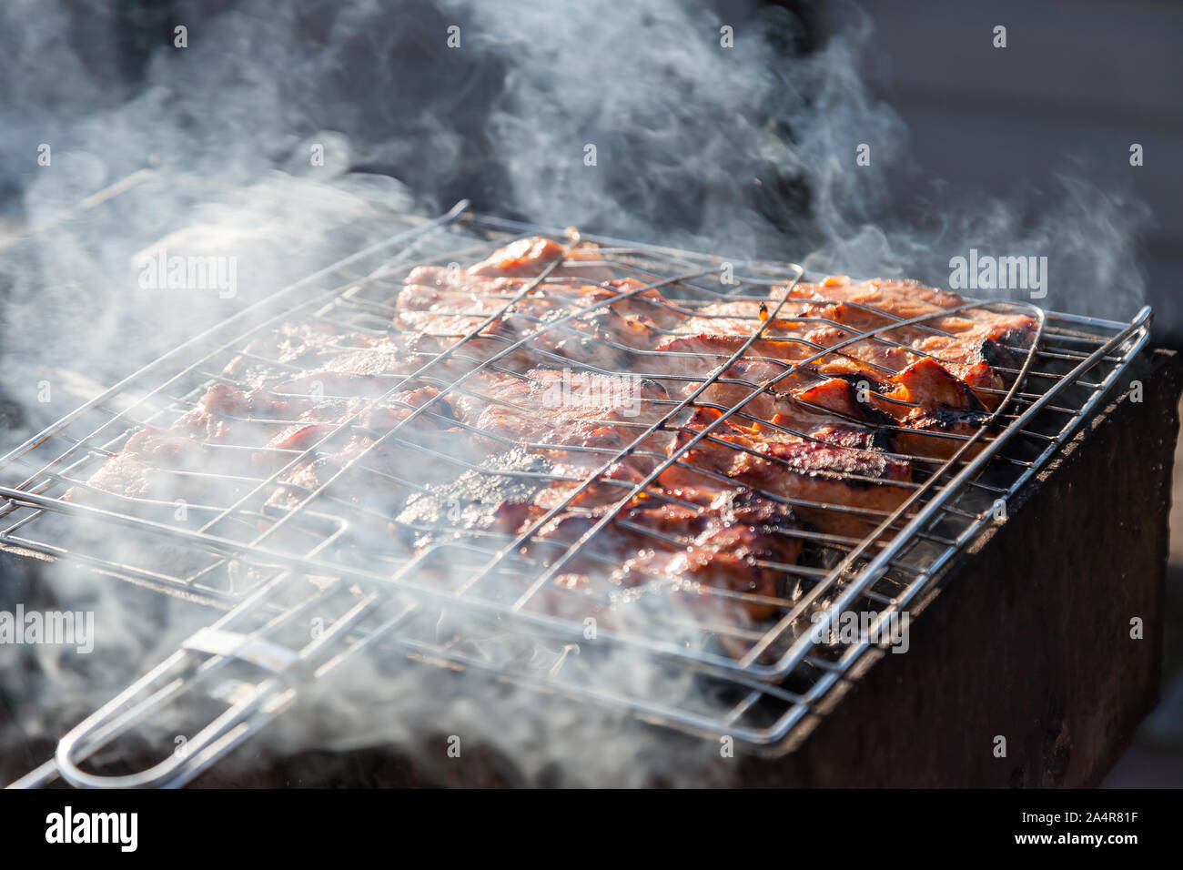 Roast chicken over an open fire hi-res stock photography and images - Alamy