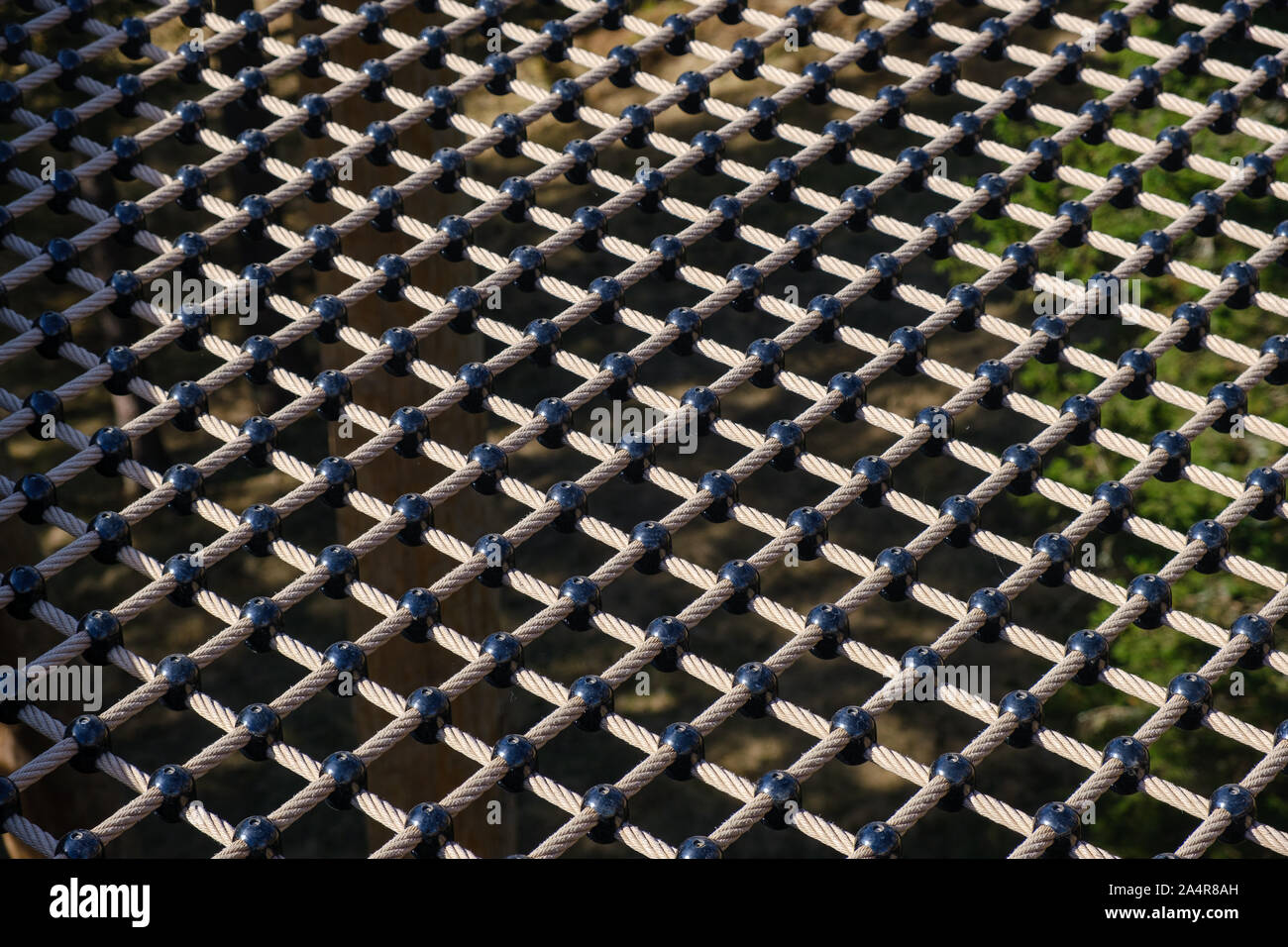 Suspended walkway safety net, mesh pattern, tied rope and knots ...