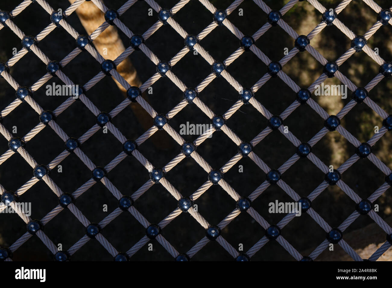 Suspended walkway safety net, mesh pattern, tied rope and knots ...