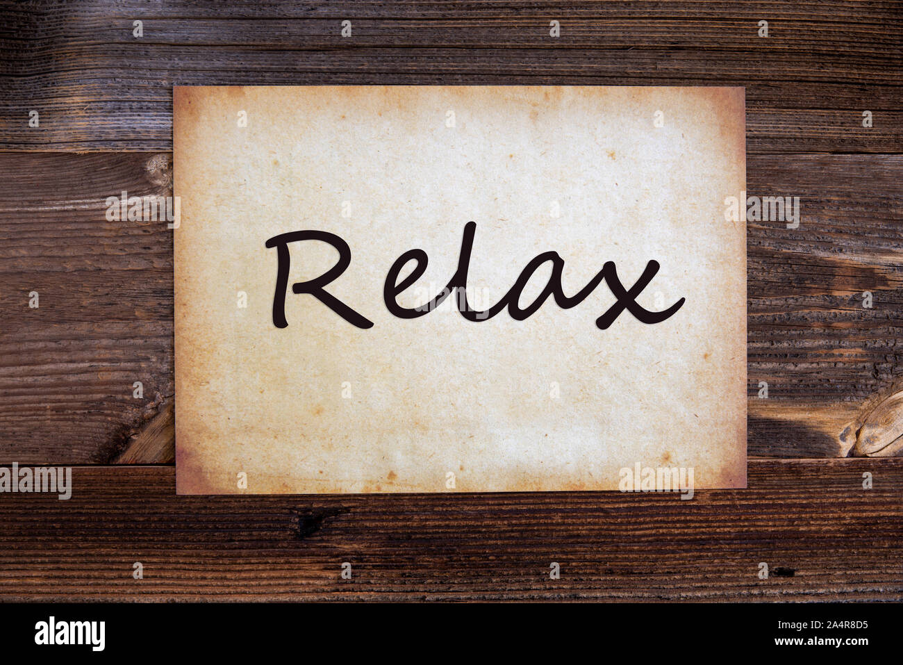 Old Paper, English Text Relax, Wooden Background Stock Photo - Alamy