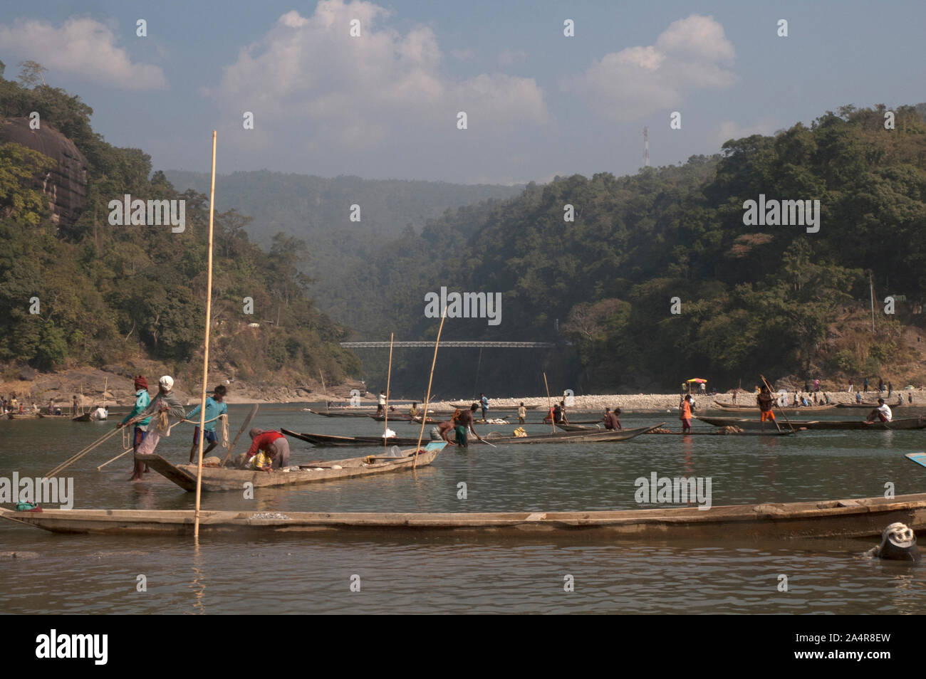 Men collect stones from the bed of Dauki river, Jaflong, Sylhet ...