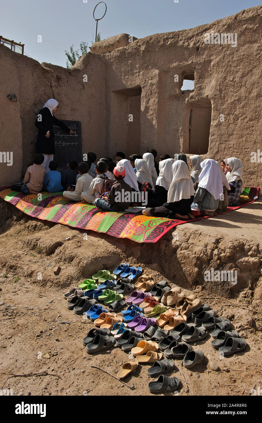 Children attend a class at the Community Based School (CBS), in Qala-e ...