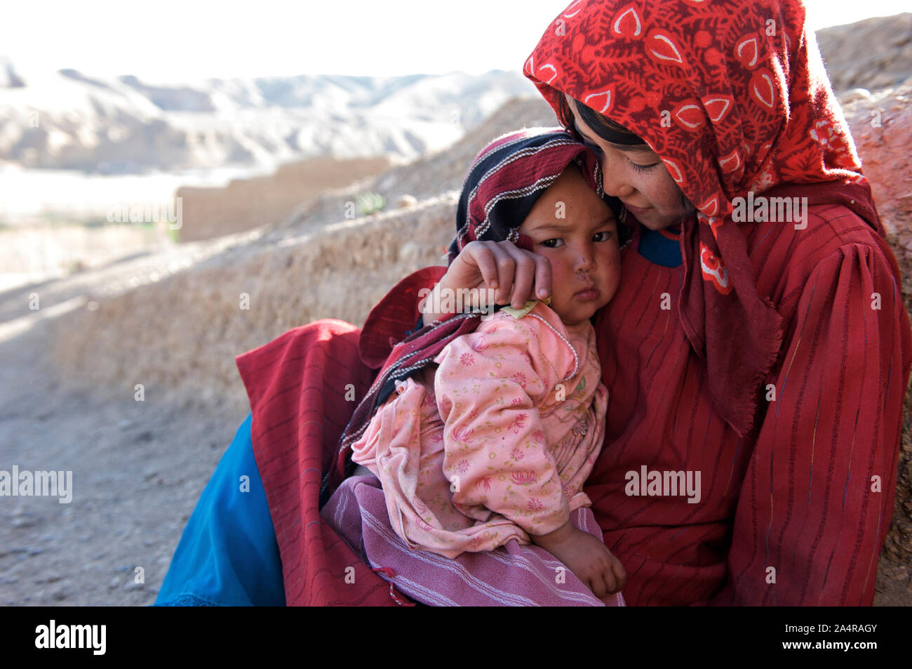 Afghanistan woman and baby hi-res stock photography and images - Alamy