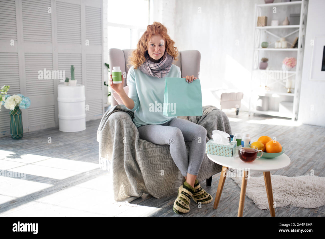 Woman feeling better after taking medication and vitamins Stock Photo ...