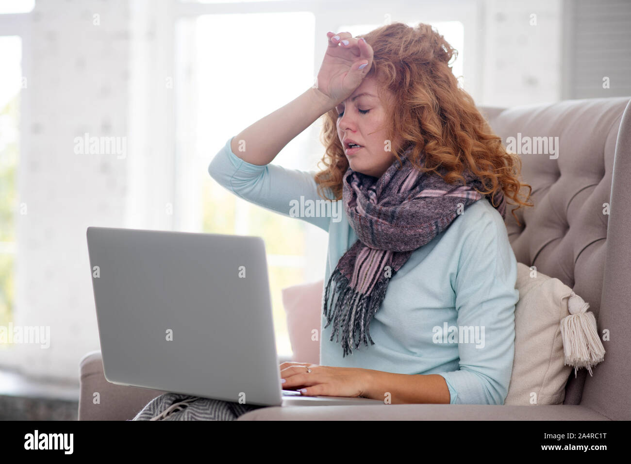 Woman searching info about flu in the Internet Stock Photo - Alamy