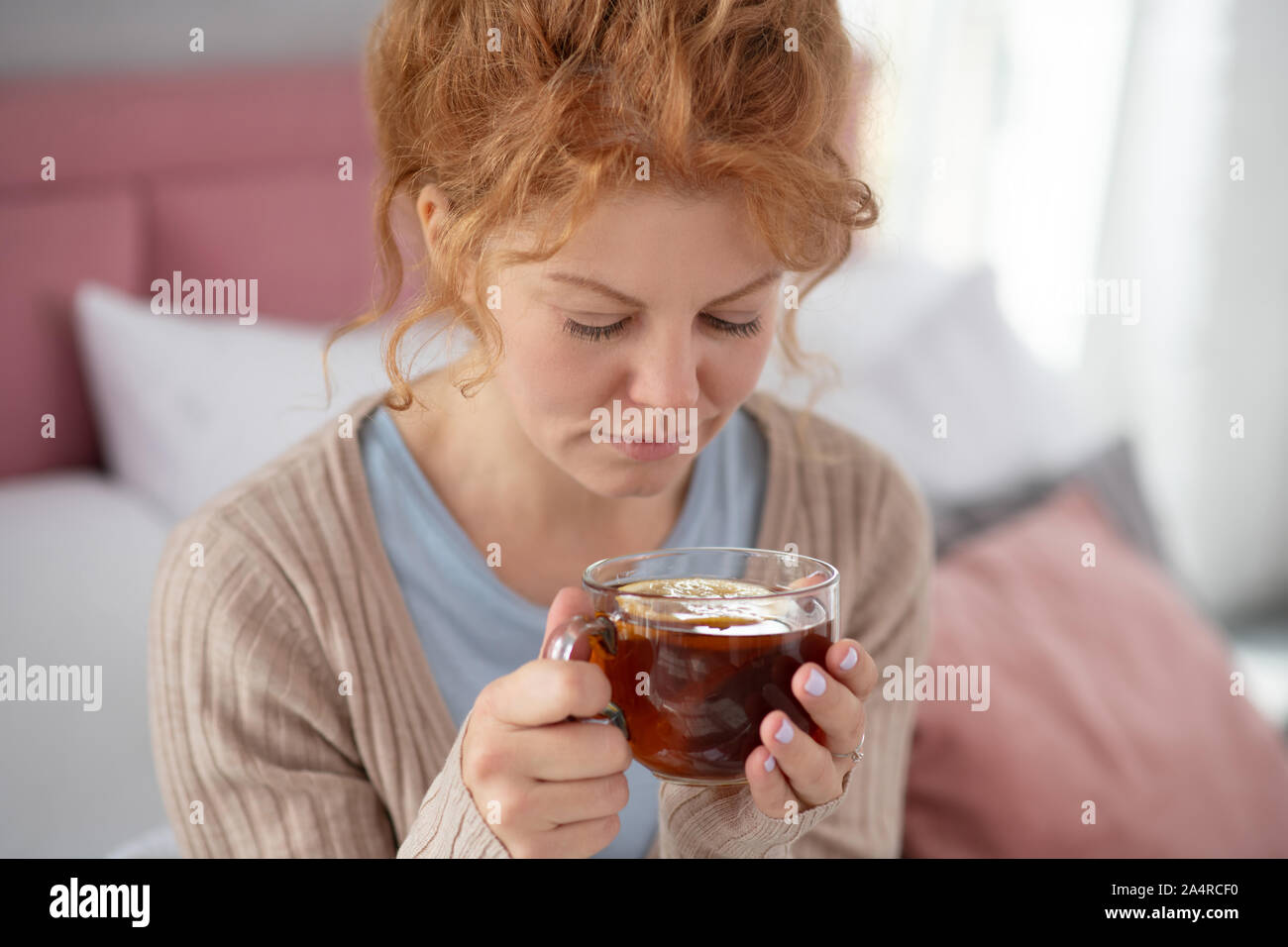 Woman drinking home upset hi-res stock photography and images - Alamy