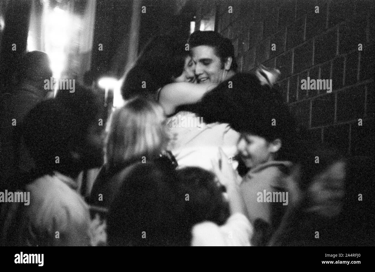 Elvis Presley Being Swarmed By Fans At The University Of Dayton Fieldhouse May 27 1956 Stock