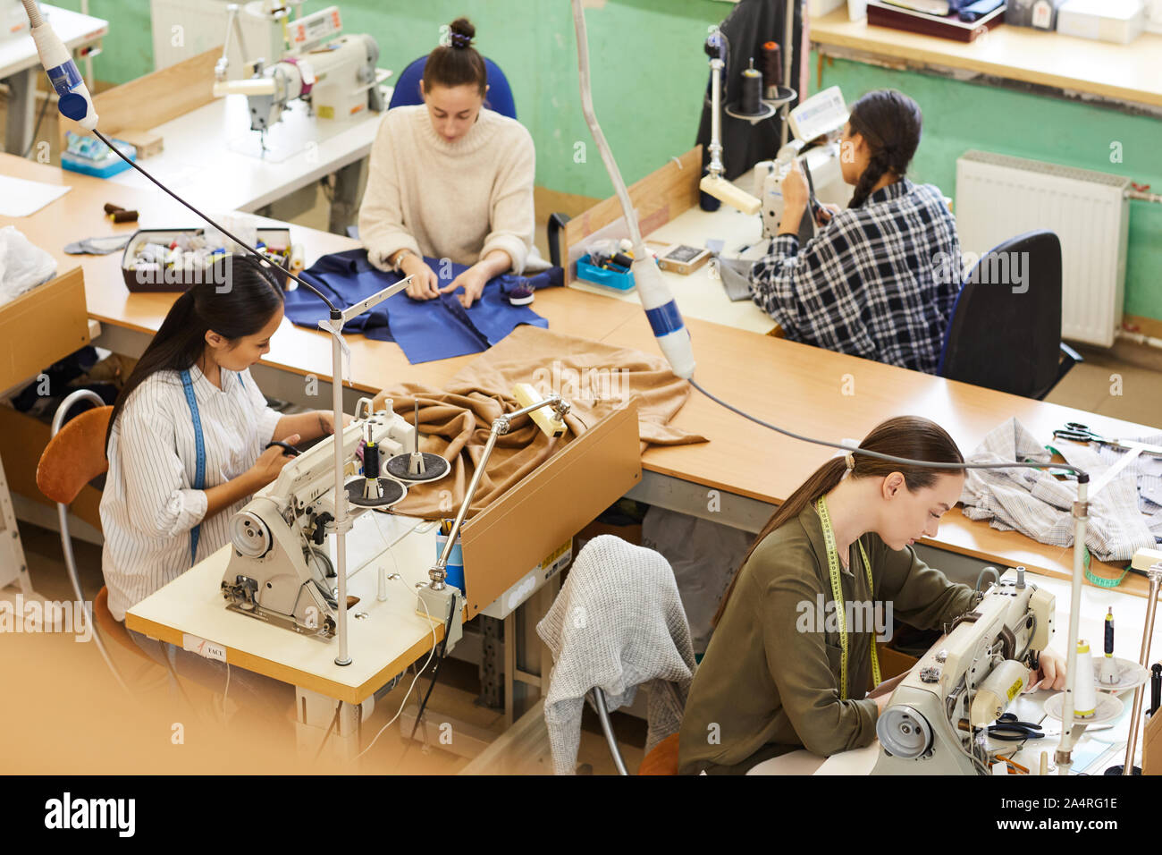 Women Using Sewing Machines High Resolution Stock Photography and ...