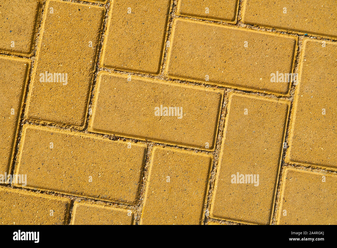 yellow paving tile for background or texture Stock Photo - Alamy
