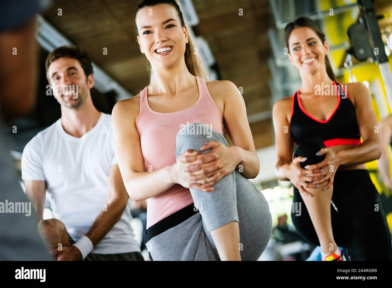 Team workout in gym to reach goals Stock Photo - Alamy