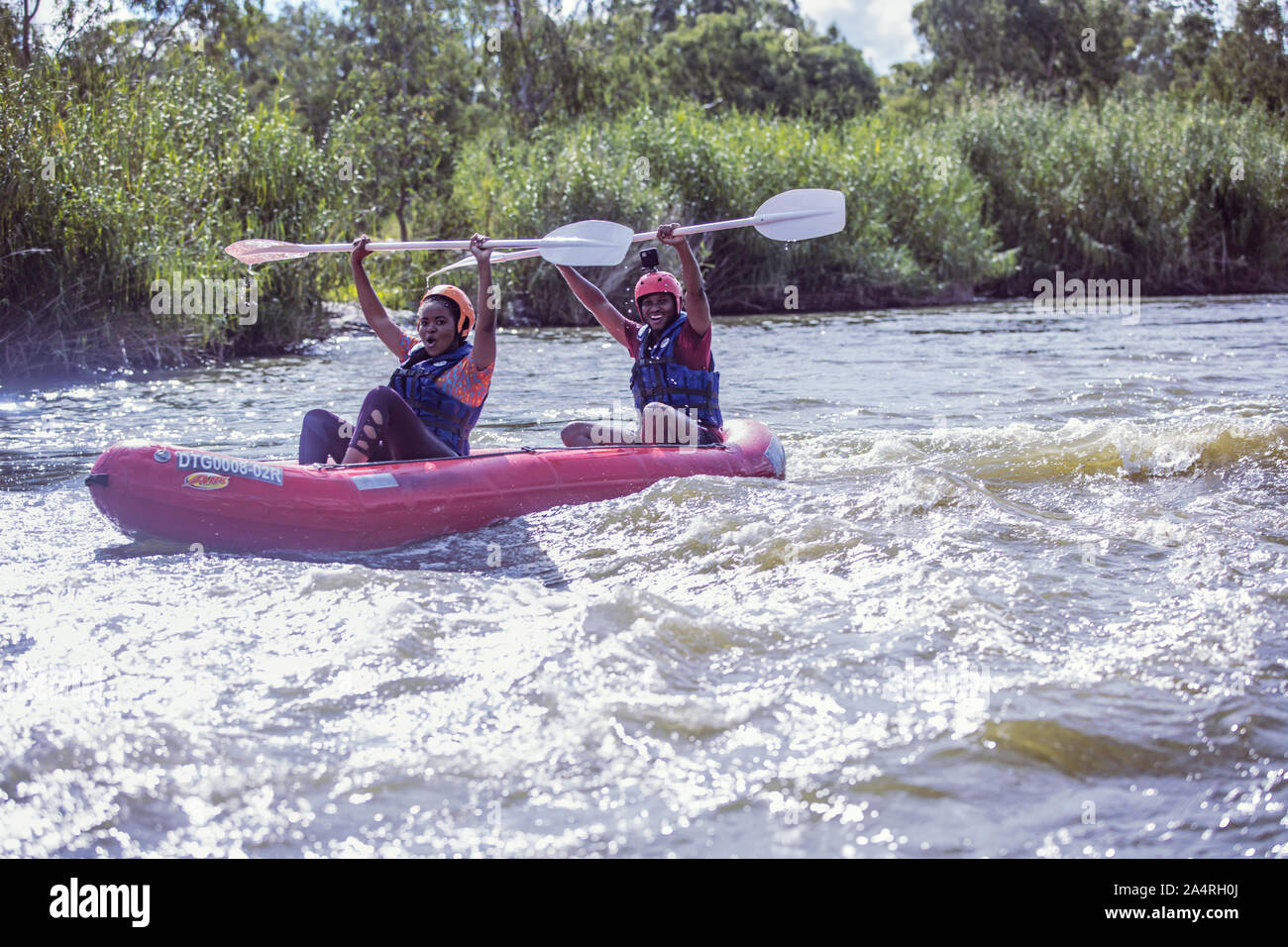 Two people rafting at Riverman Cabins Stock Photo - Alamy