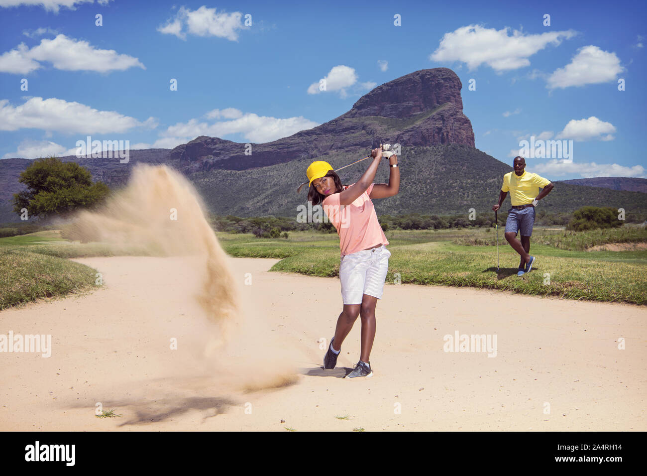 A woman playing golf in Limpopo Stock Photo - Alamy