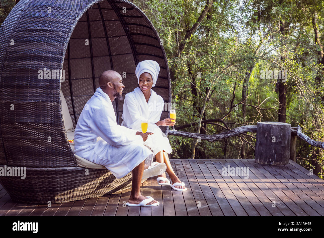 A couple drinking mimosas at a spa Stock Photo - Alamy