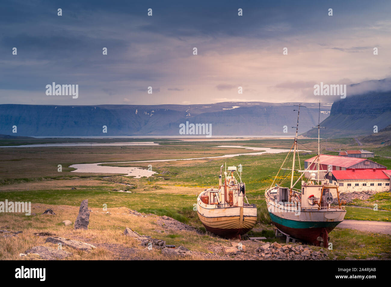 Oldest steel ship in Iceland abandoned rusty ashore in the grass, West ...