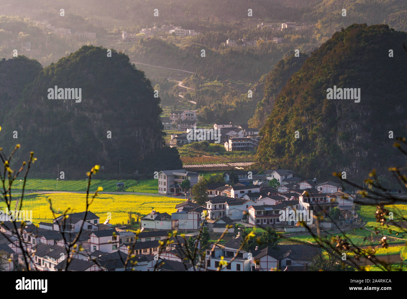 Rapeseed flower field and villages at Wanfenglin National Geological ...