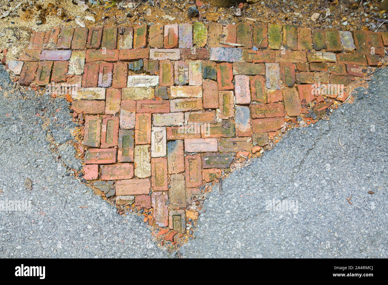 Remnant of old bricks from the former Hainan Village is preserved on ...