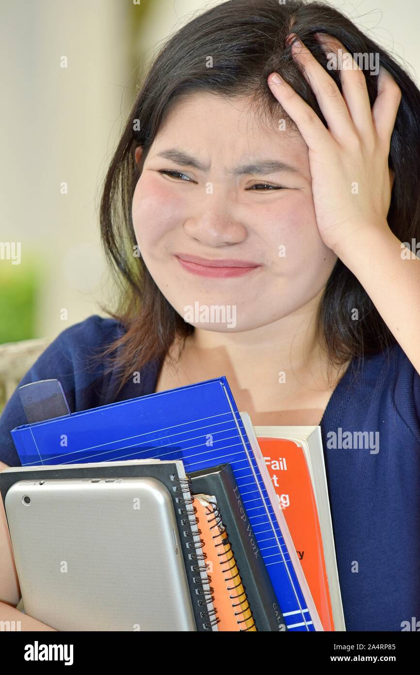 Stressful Girl Student With Notebooks Stock Photo - Alamy