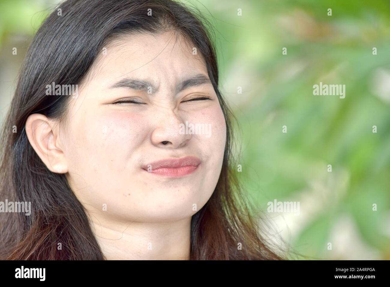 Youthful Diverse Female And Disgust Stock Photo - Alamy