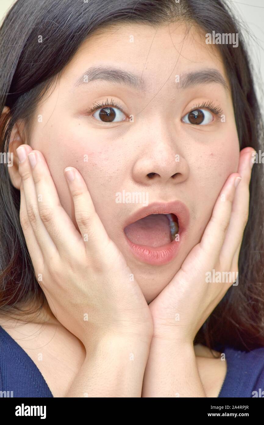 Startled Young Diverse Female Stock Photo - Alamy