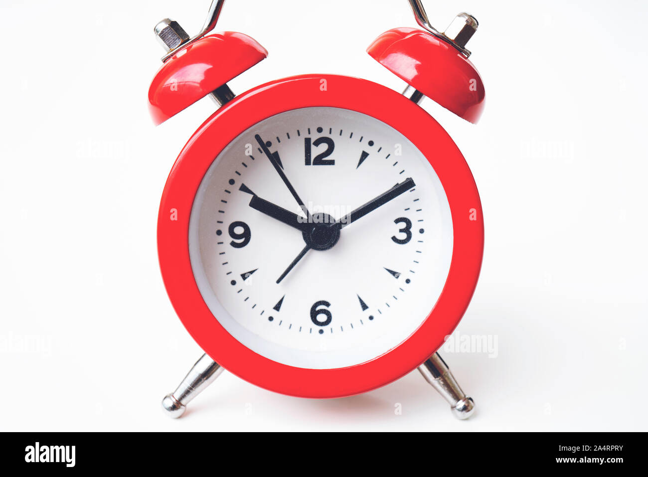 close up of a vintage red bell clock on white background Stock Photo ...